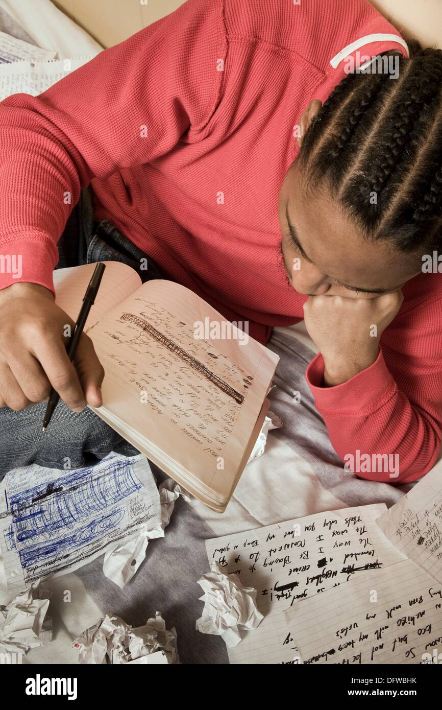 Solitary man writing hi-res stock photography and images - Alamy