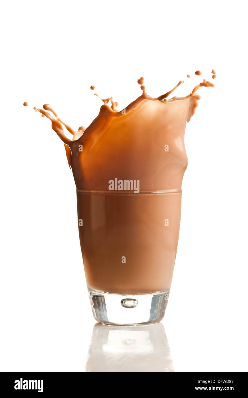 Chocolate milk splash isolated on white Stock Photo - Alamy