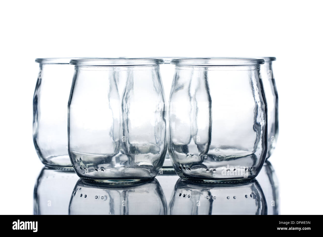 Empty glass yoghurt pot Stock Photo - Alamy