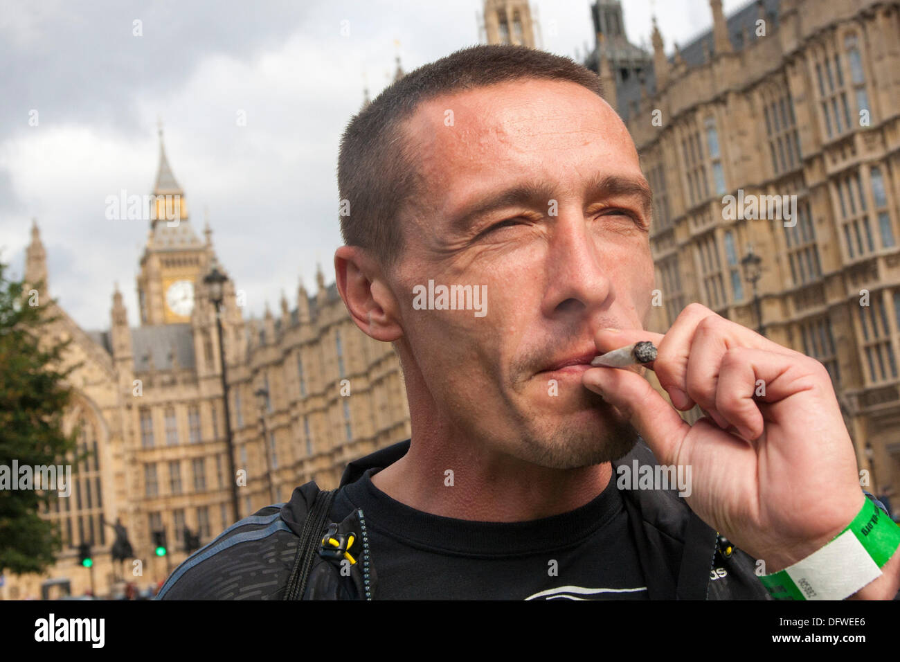 London, UK. 09th Oct, 2013. A campaigner enjoys a smoke as NORML UK ...