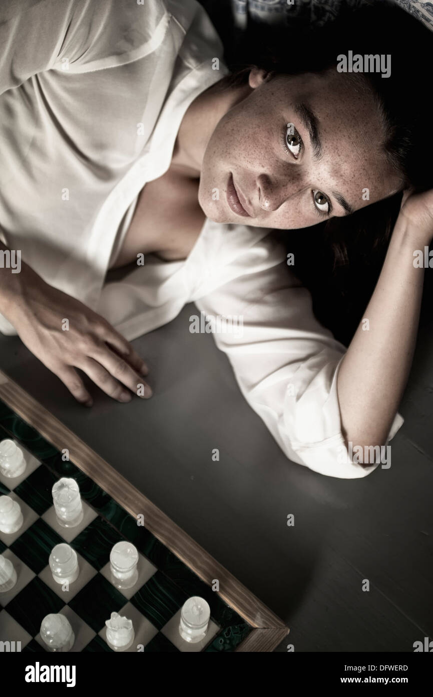 Beautiful girl playing chess hi-res stock photography and images - Alamy