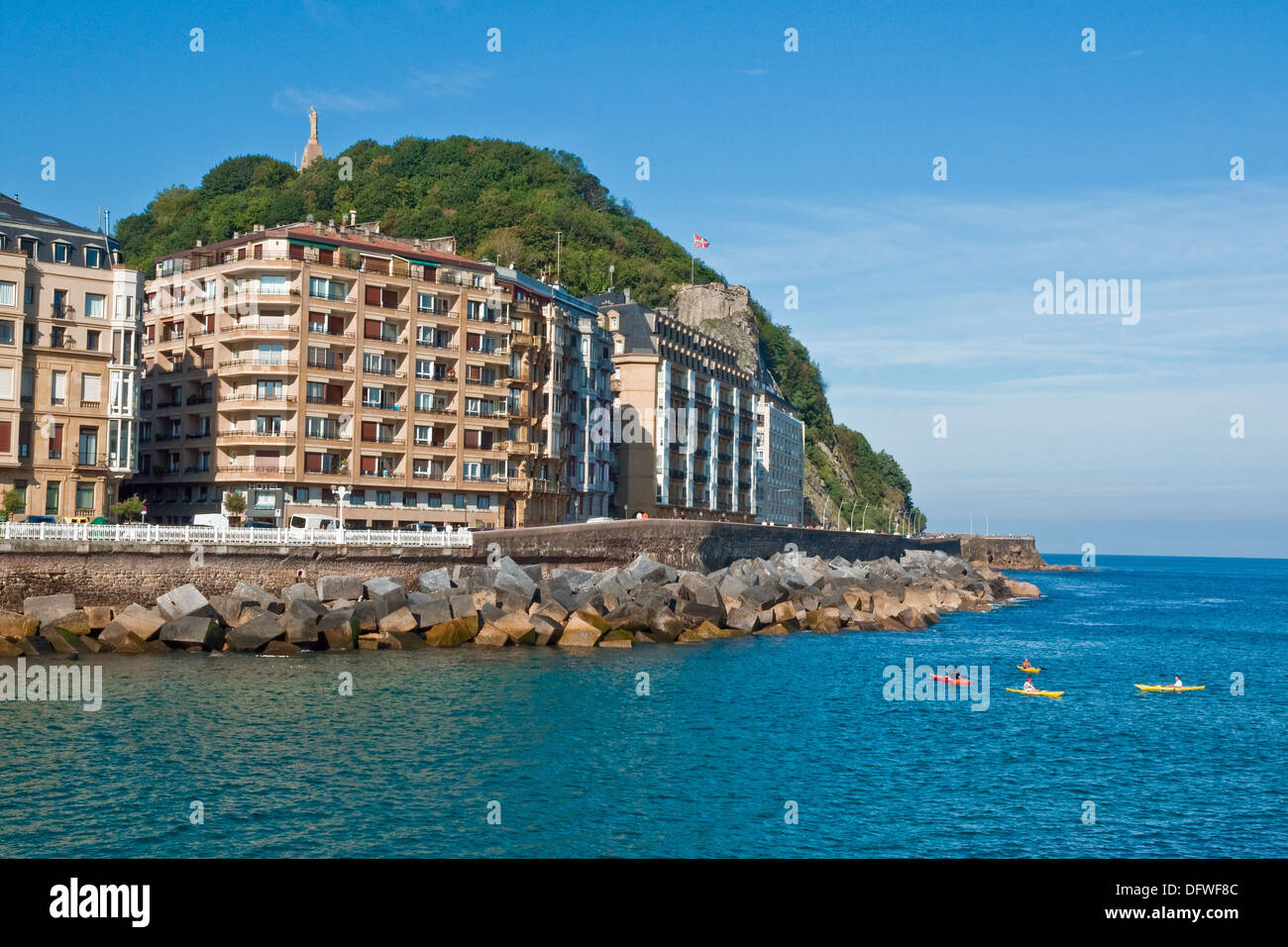Sea kayaking in the mouth of the Urumea River, San Sebastian, Spain ...