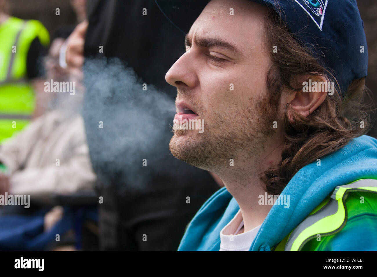 London, UK. 09th Oct, 2013. Clark French exhales smoke as cannabis ...