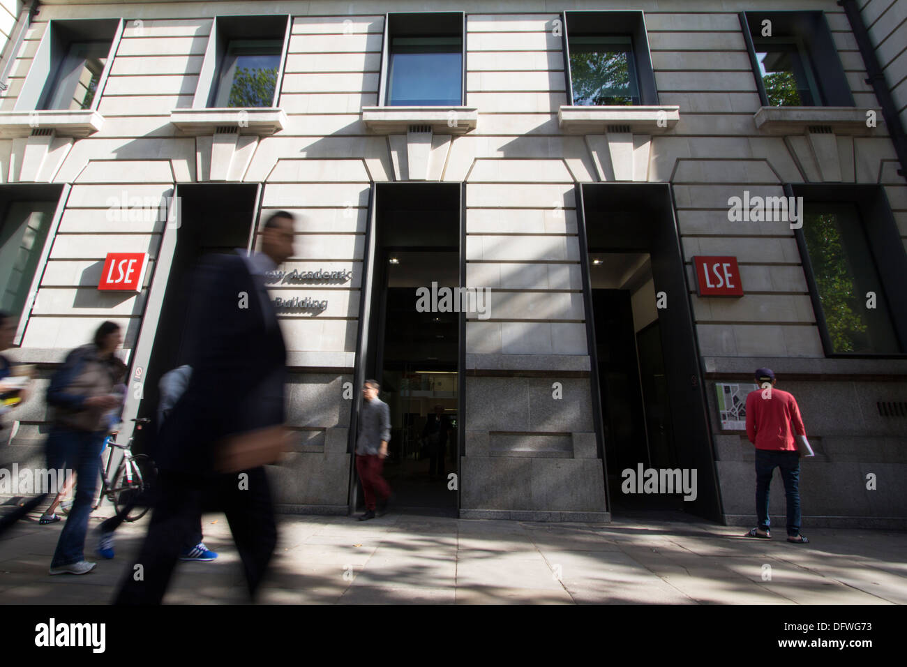 Pedestrians walk past the New Academic Building at the London School of ...