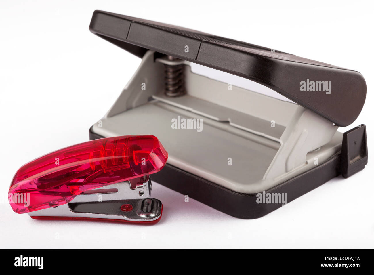 Red stapler and puncher isolated on the white background Stock Photo ...