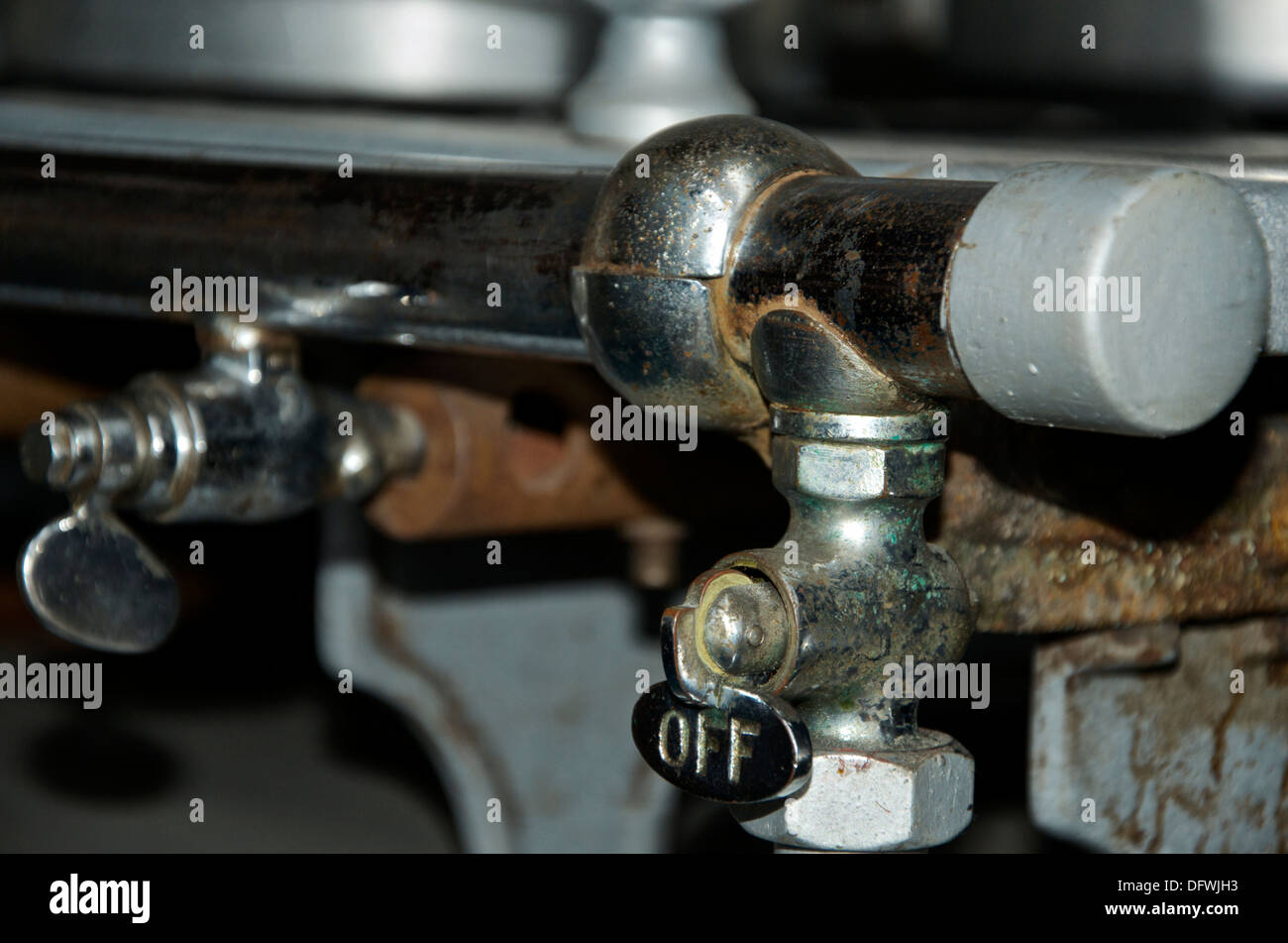 The 'OFF' switch of a 1940's industrial gas cooker Stock Photo - Alamy