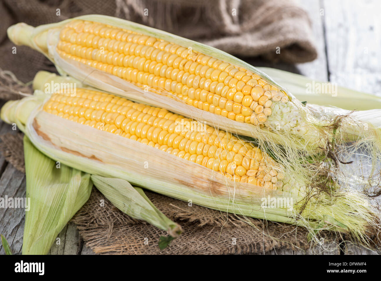 Some fresh Corncobs on vintage background (close-up shot Stock Photo ...