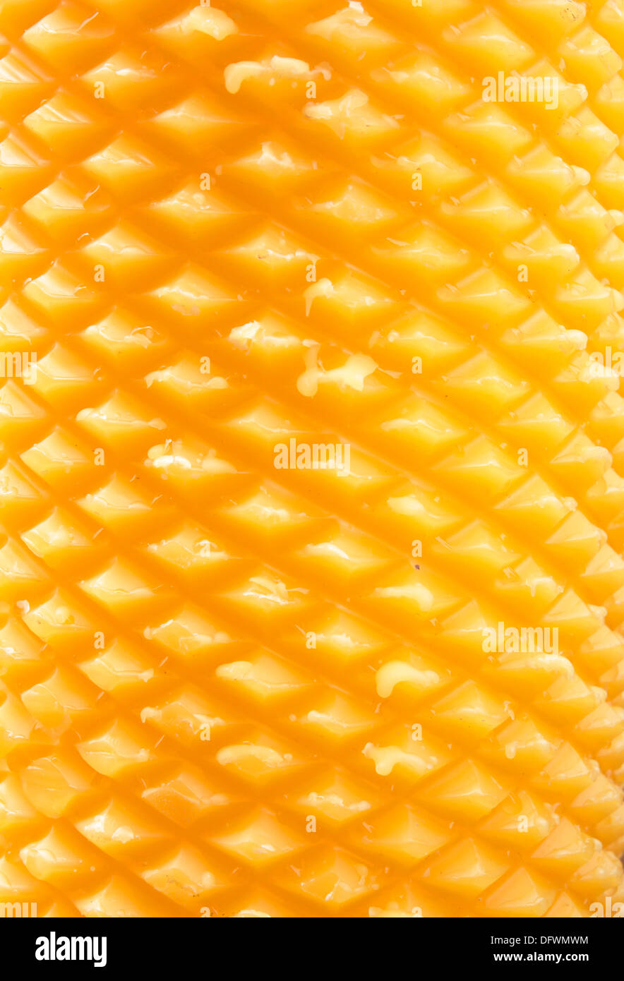 The art on the candle Candle yellow background Stock Photo - Alamy