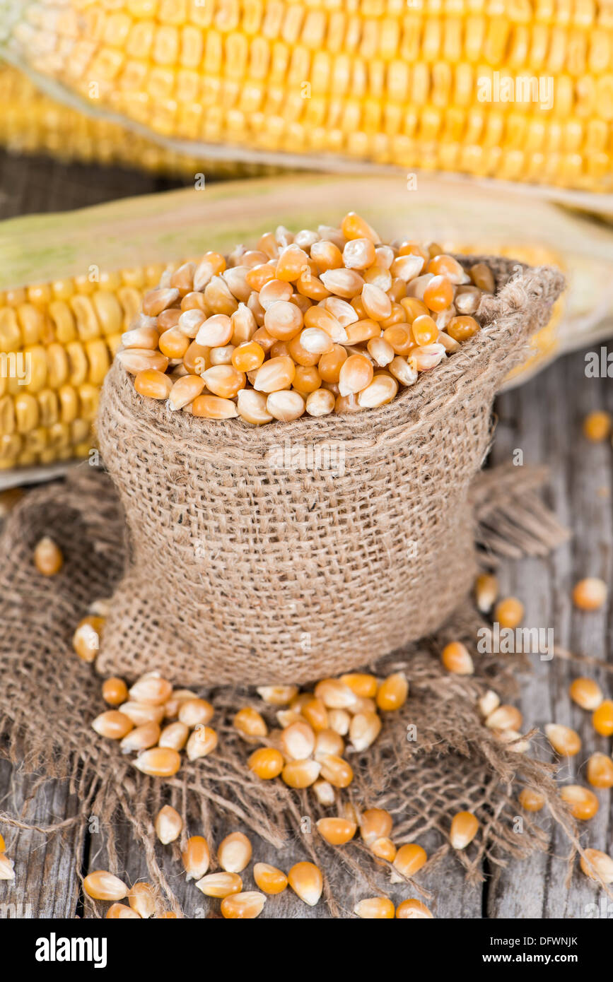 Bag with dried Sweetcorn on rustic background Stock Photo - Alamy