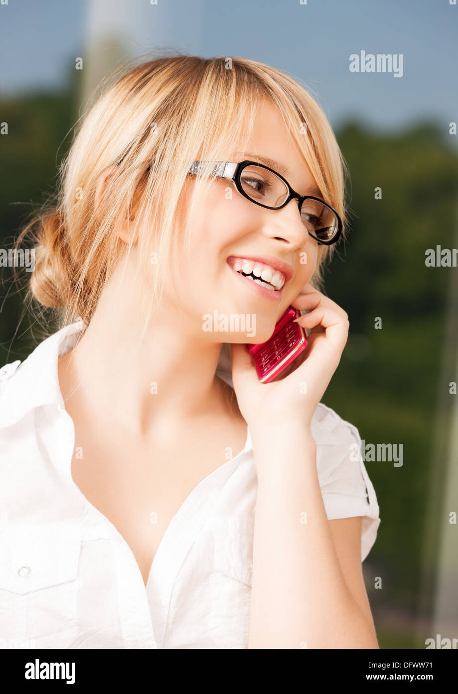 teenage girl with cell phone calling Stock Photo - Alamy