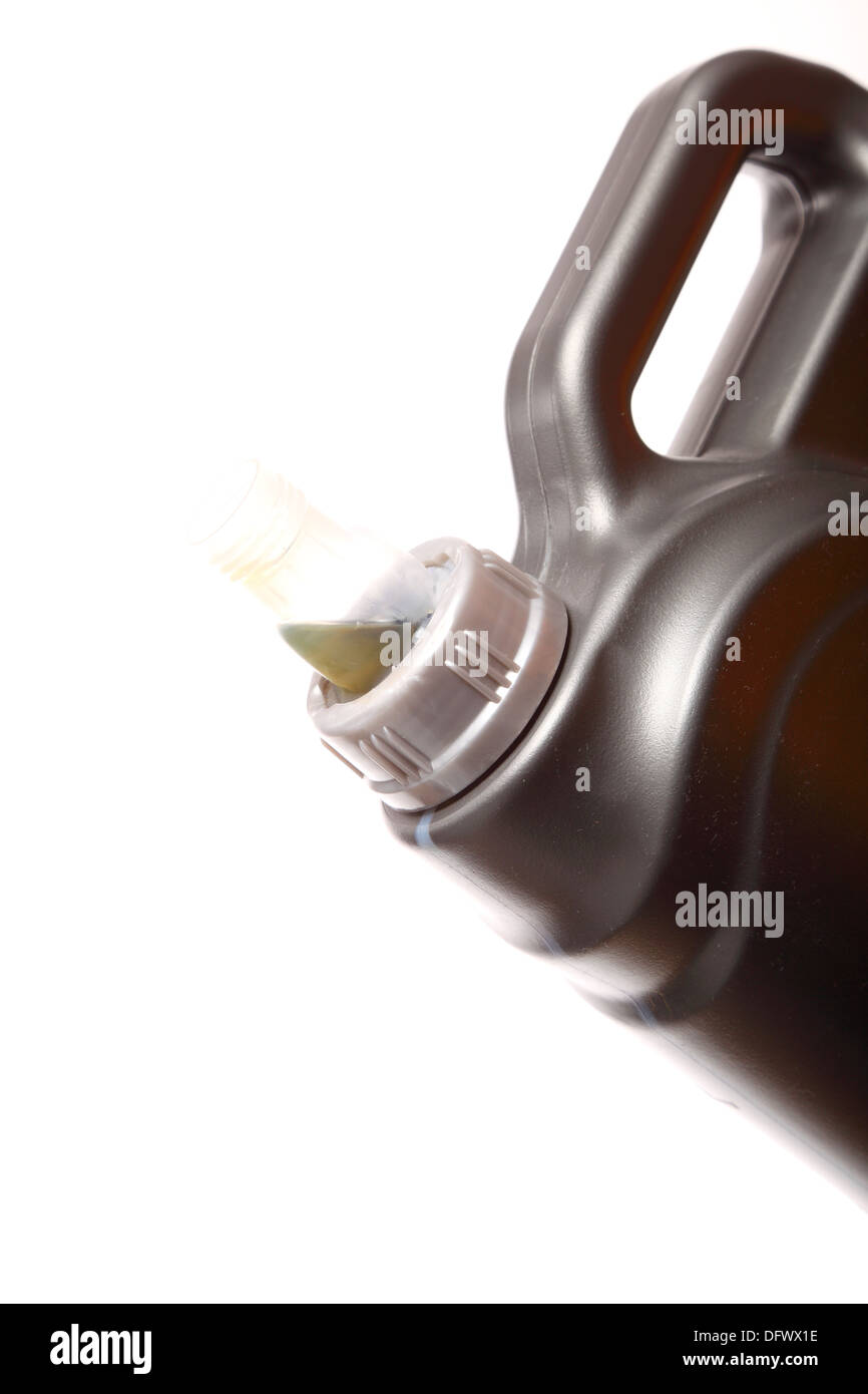 Closeup gray canister with car engine oil white background Stock Photo ...