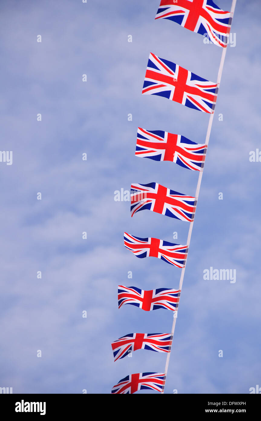 Union flag bunting against blue sky Stock Photo - Alamy