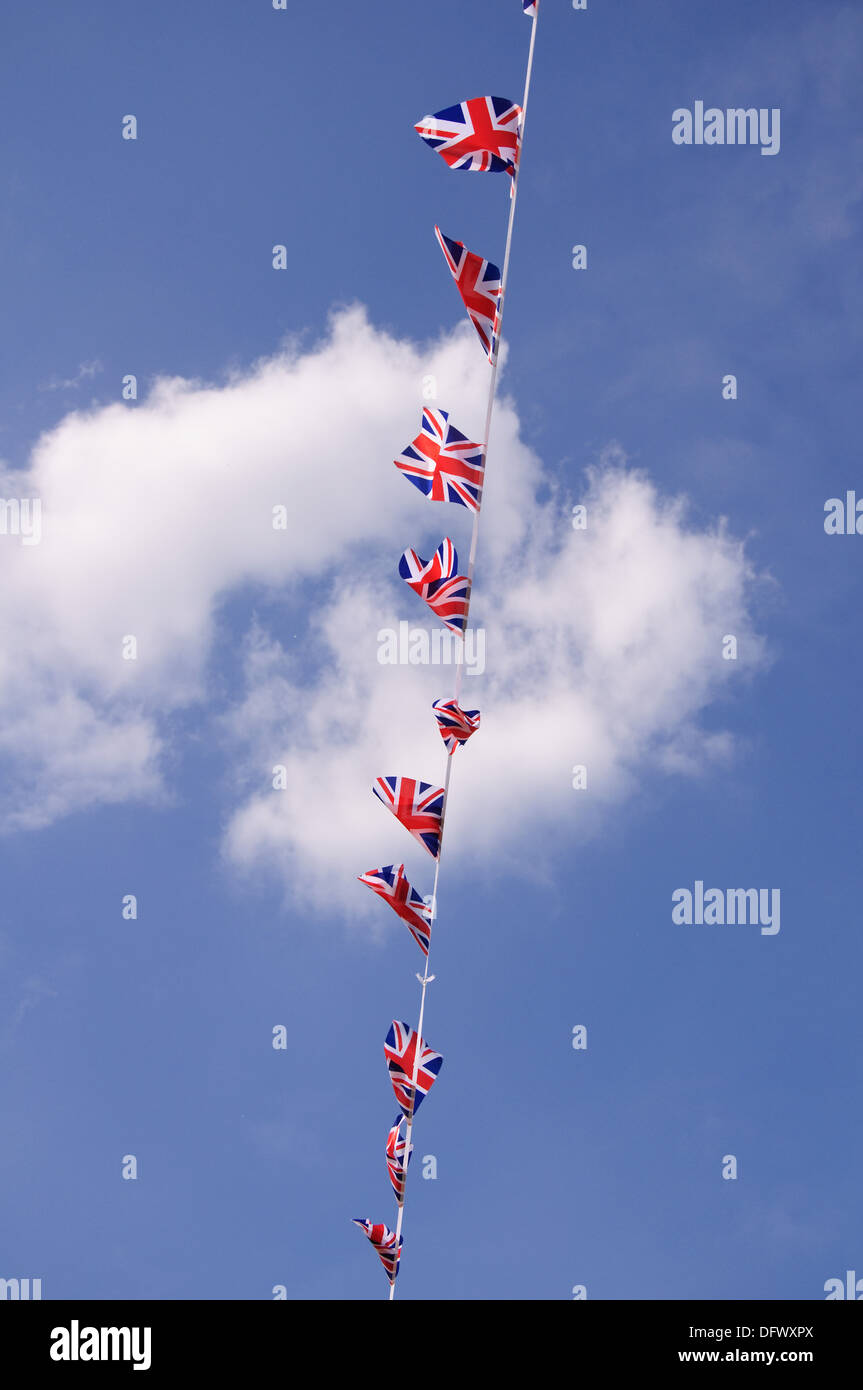 Union flag bunting against blue sky Stock Photo - Alamy