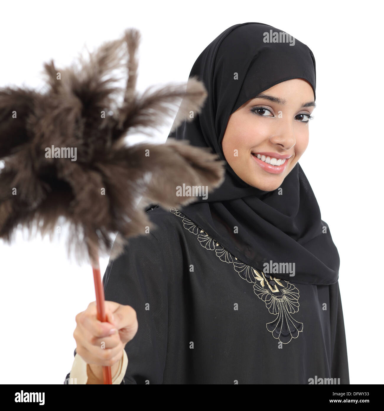 Arab housewife woman smiling and holding a duster clean isolated on a ...