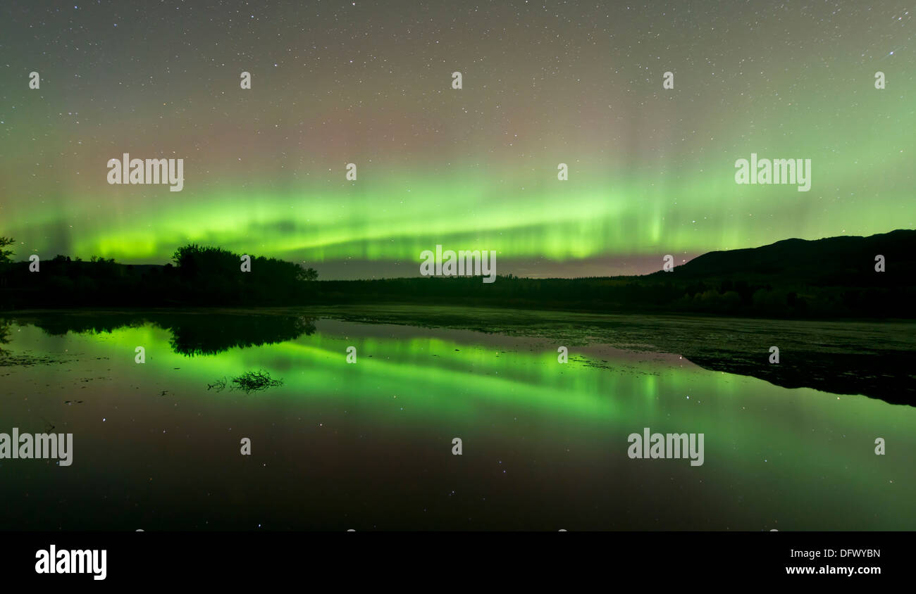 Aurora borealis over Fish Lake, Whitehorse, Yukon, Canada Stock Photo ...