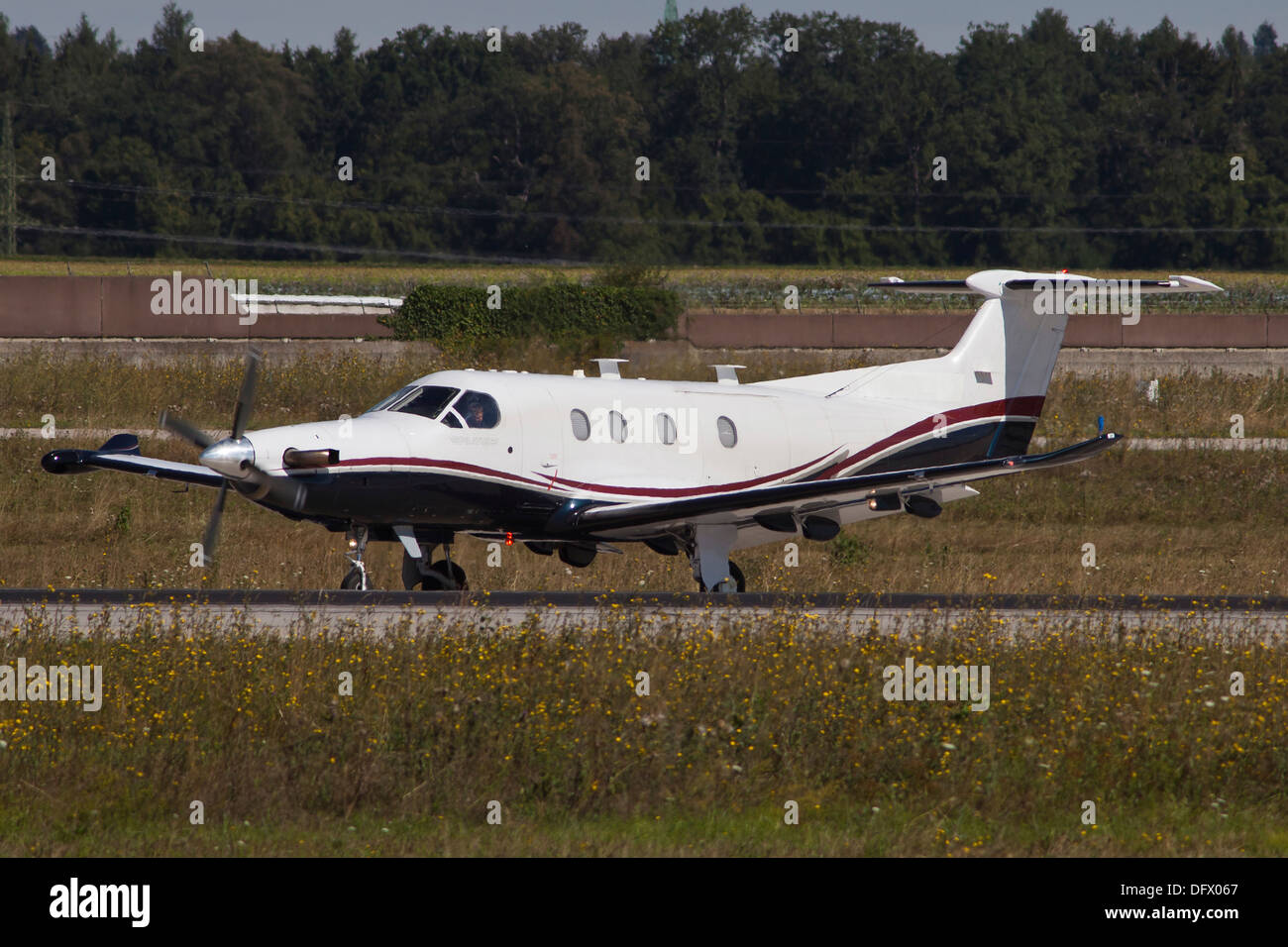 A U.S. Air Force U-28 plane taxiing on the runway at Stuttgart, Germany ...