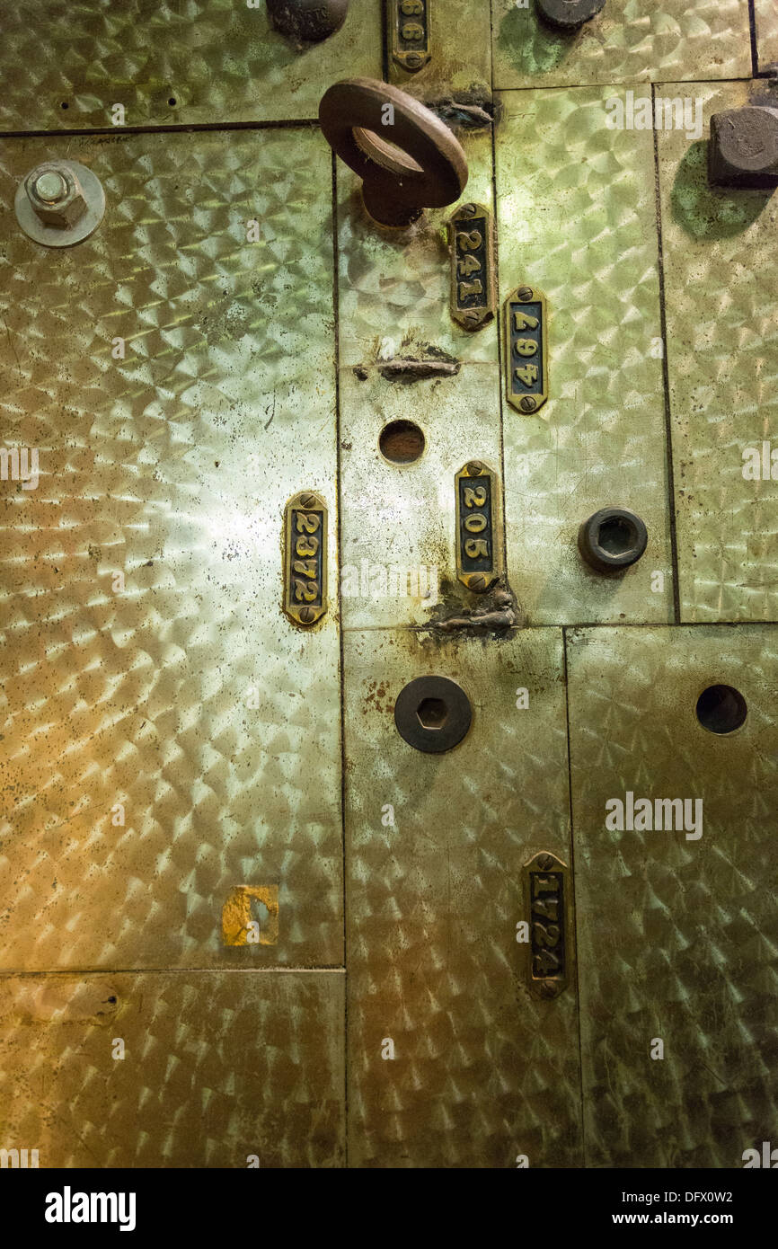 Close-up of an old style mailboxes / po boxes - gold metal Stock Photo ...