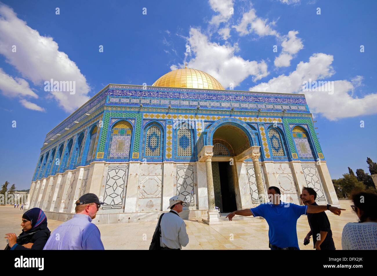 A tourist group leaves the area of the Dome of the Rock on the Temple ...
