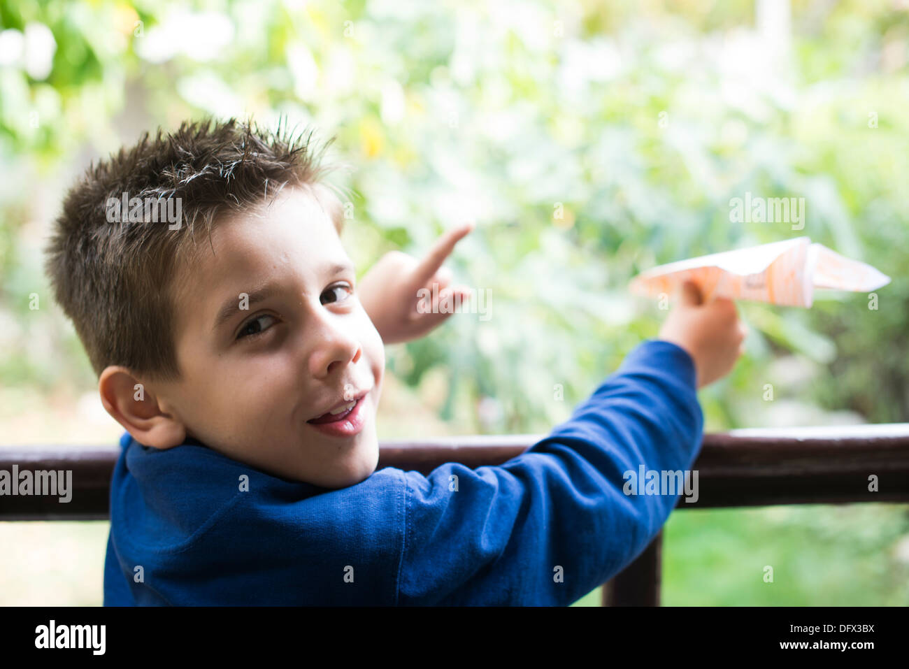 Hand throwing paper plane hi-res stock photography and images - Alamy