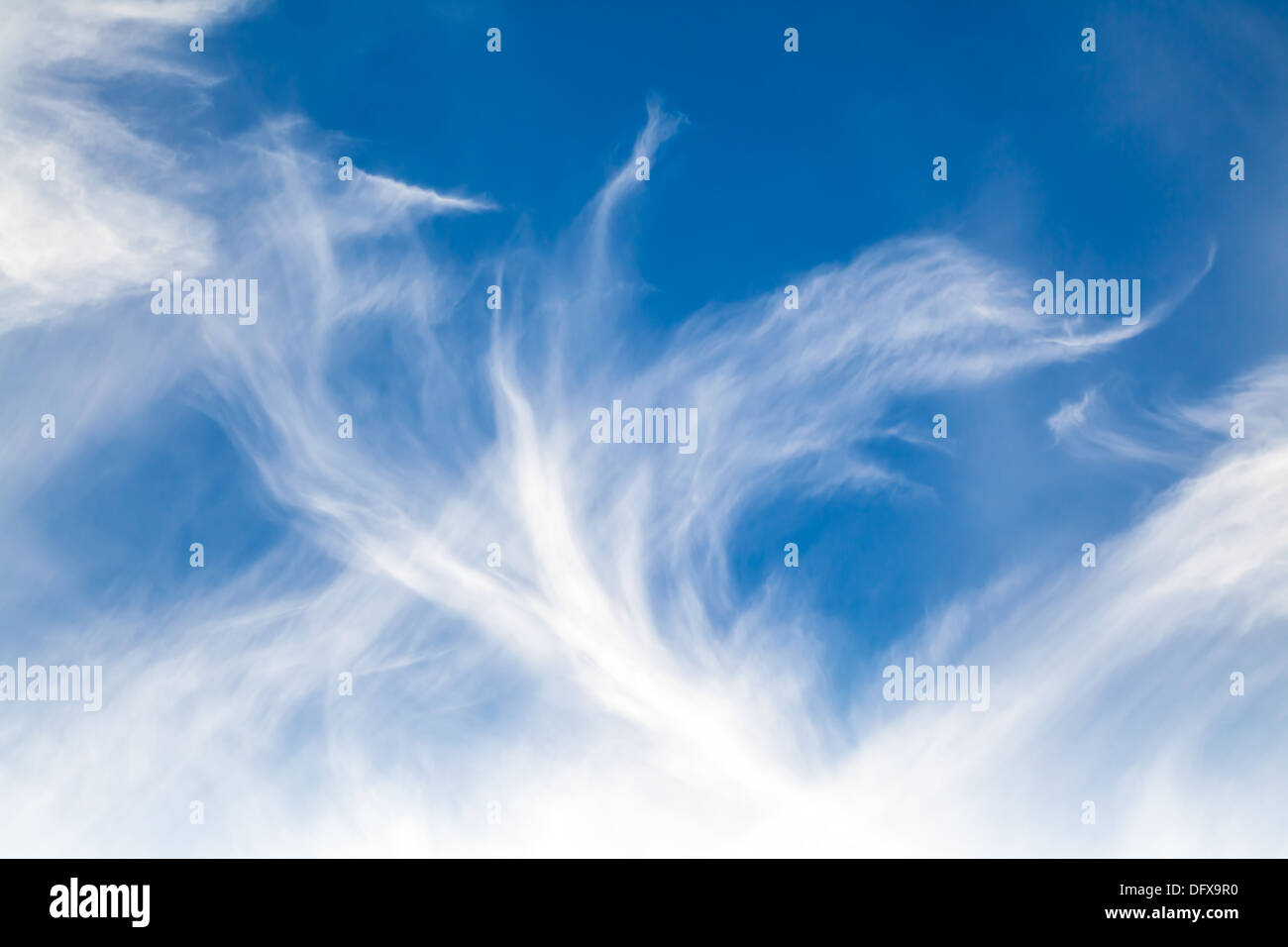 Natural blue windy cloudy sky background photo texture Stock Photo - Alamy