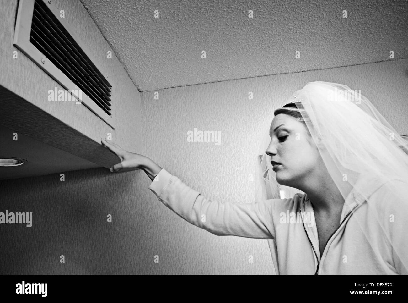 Woman cooling off arms hi-res stock photography and images - Alamy