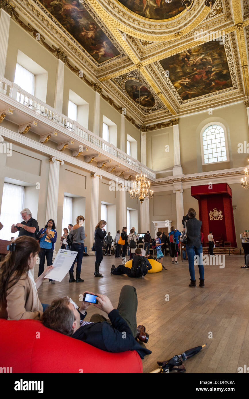 Visitors examine the interior of the Banqueting Hall in Whitehall ...