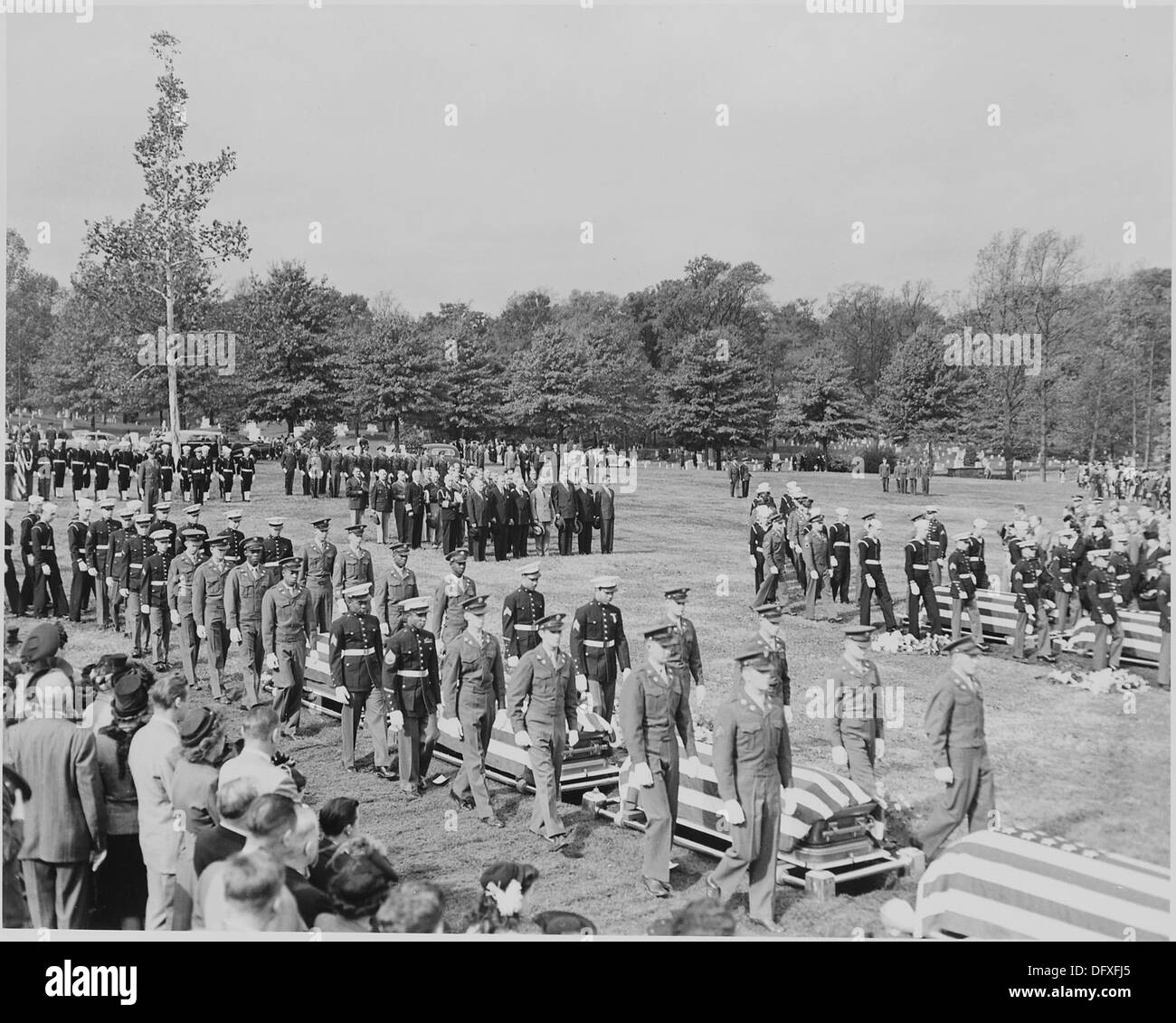 President Harry S. Truman attends the burial of twenty soldiers at ...