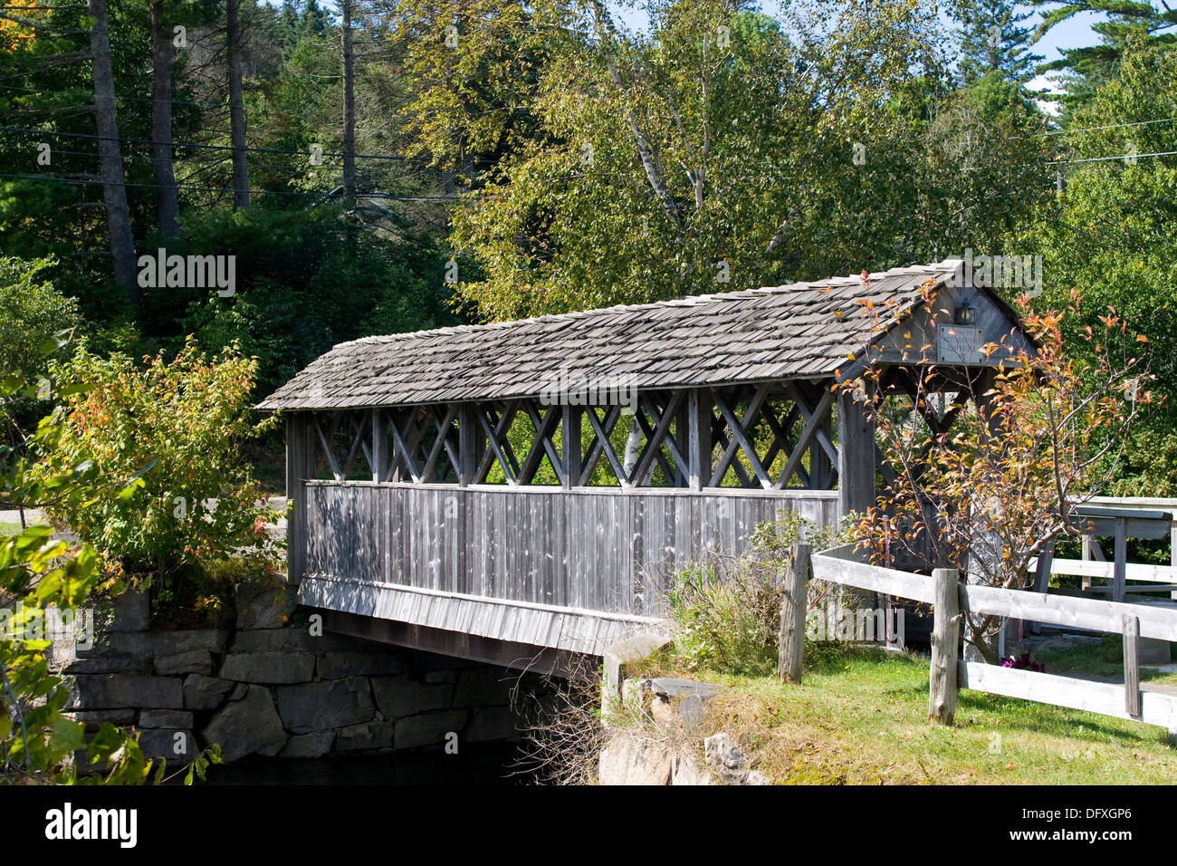 Beautiful wooden covered footbridge in rural landscape Stock Photo - Alamy