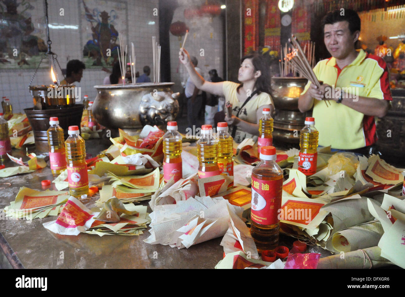 People praying at goddess mercy hi-res stock photography and images - Alamy
