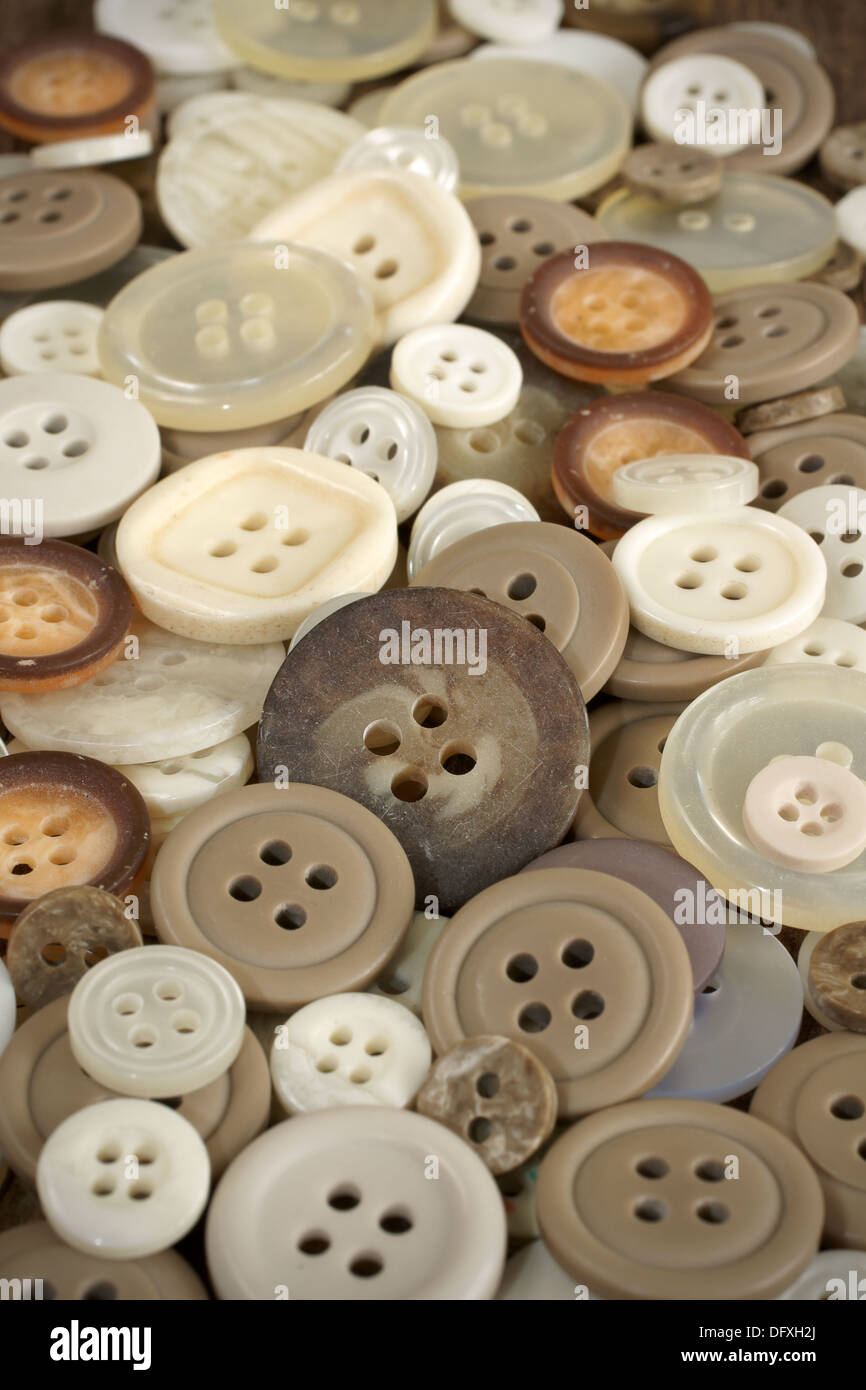 Stack of old fashioned brown beige and white buttons Stock Photo - Alamy