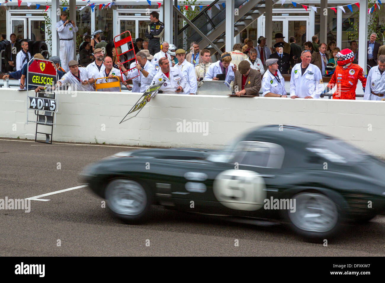 1963 Jaguar E-Type lightweight "Lowdrag" passes the pits during the ...
