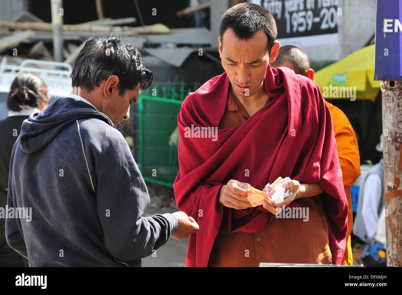 Monk money hi-res stock photography and images - Alamy