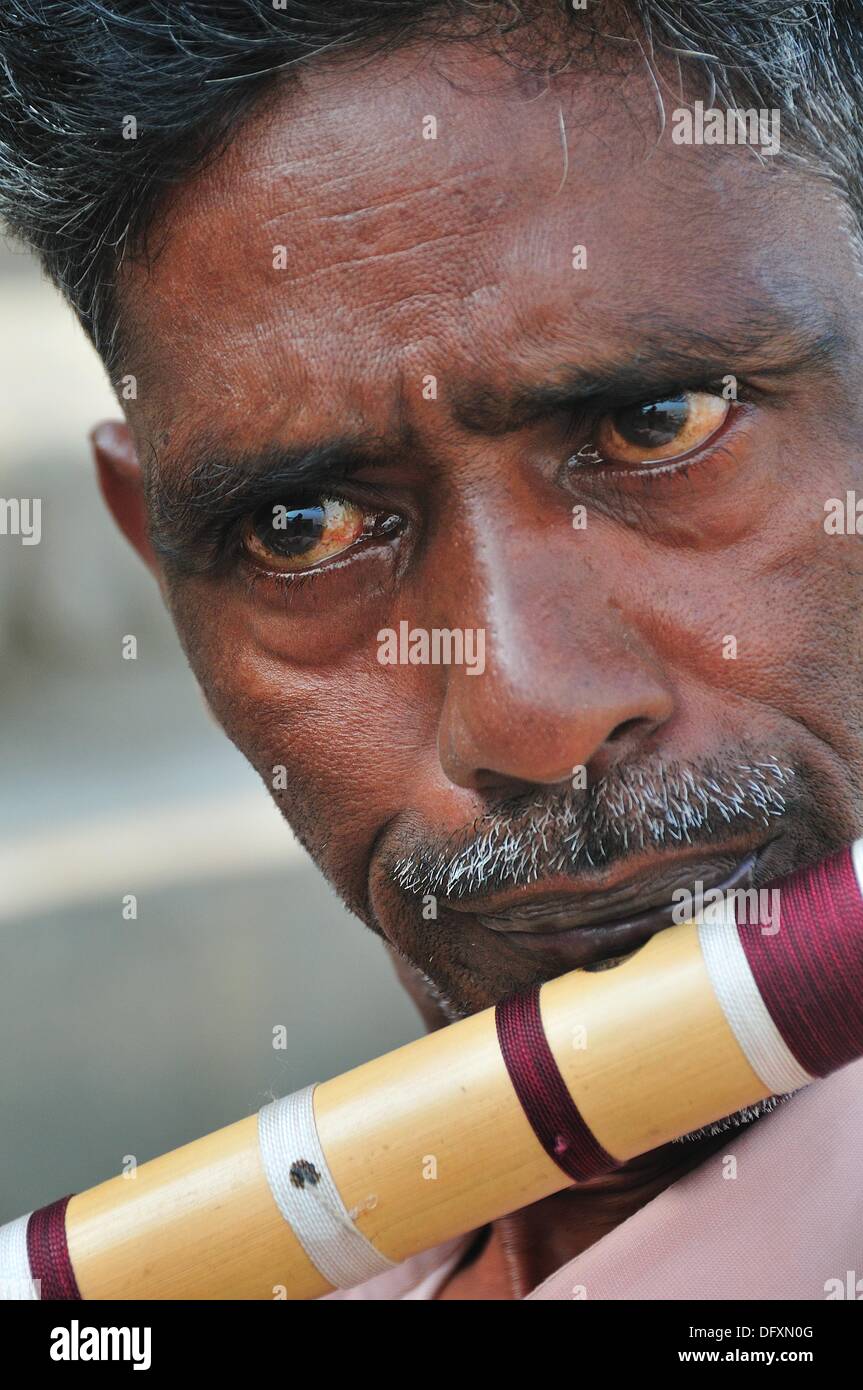 Indian man with flute hi-res stock photography and images - Alamy
