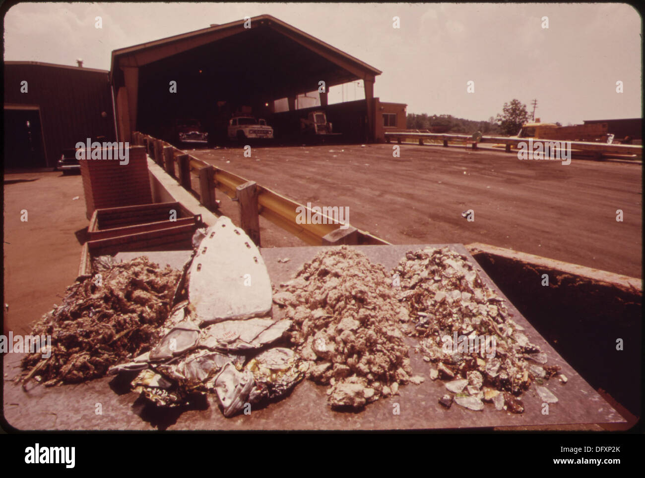 This image shows a sorting table used outside a recycling plant in ...