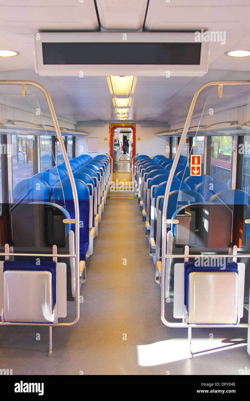 Rows of seats in a passenger train car Stock Photo - Alamy