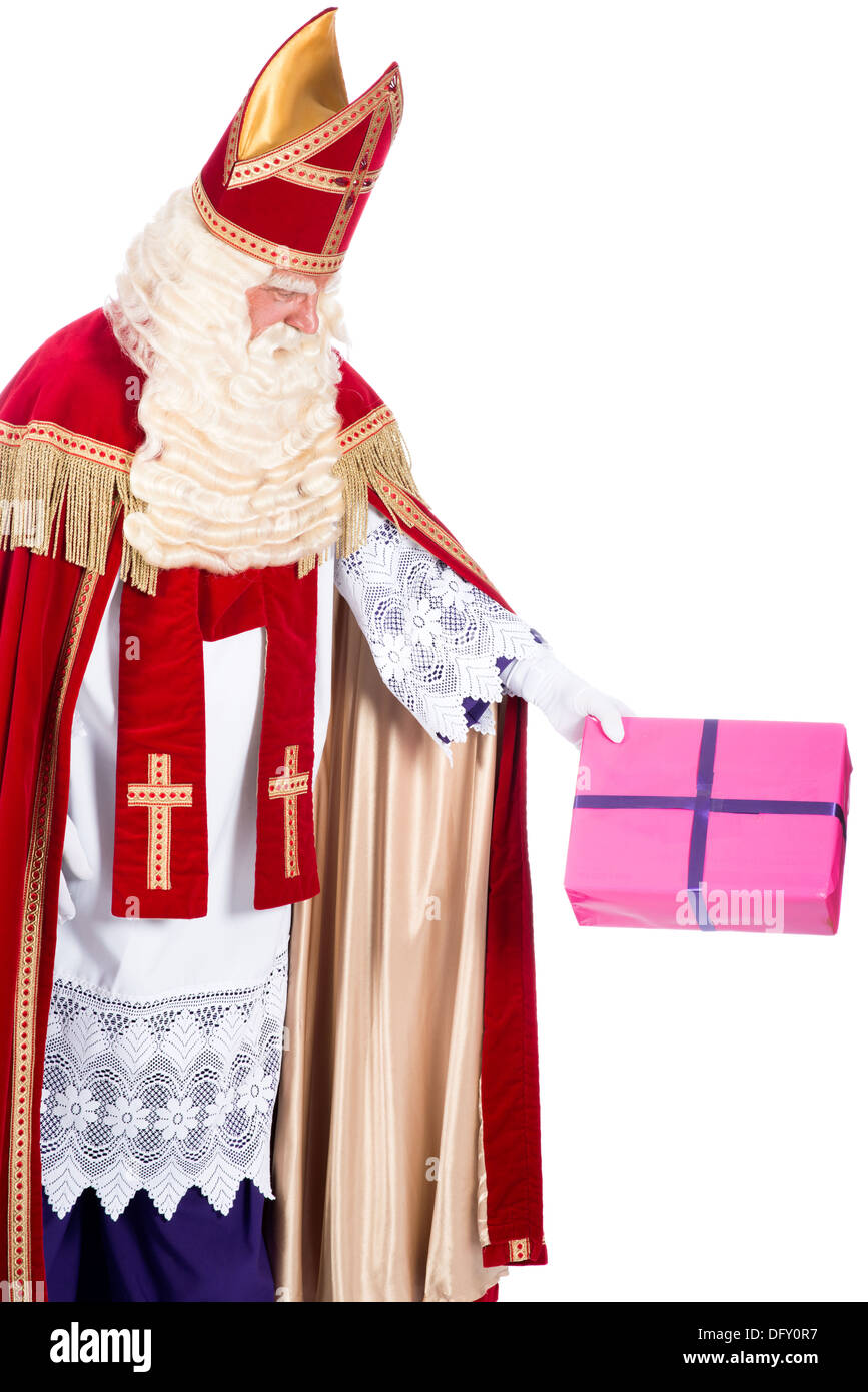 Sinterklaas giving a present to a child, on a white background Stock ...