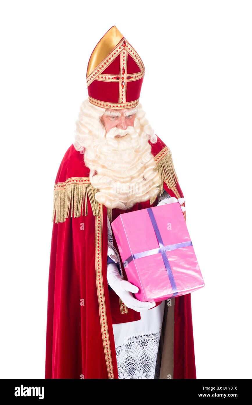 Sinterklaas giving a present to a child, on a white background Stock ...