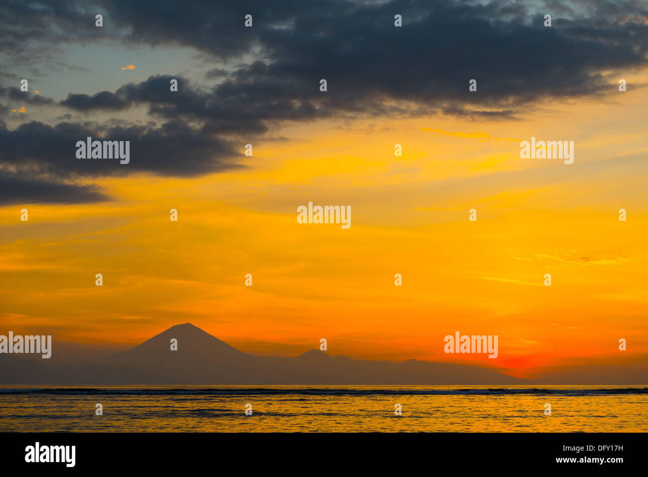 Colorful sunset over Pacific Ocean with Bali island on horizon Stock ...