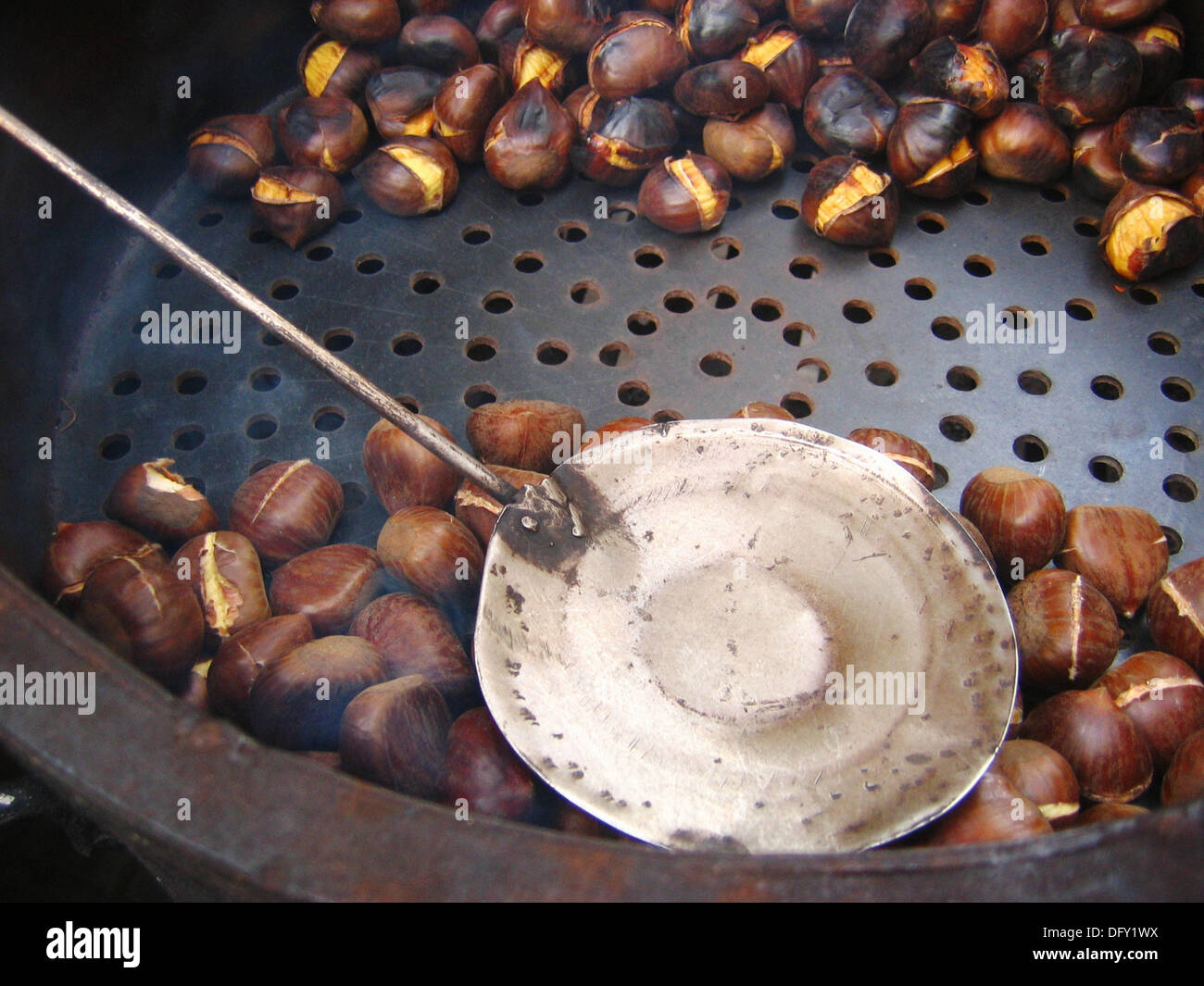 Traditional roast chestnut stall High Resolution Stock Photography and ...