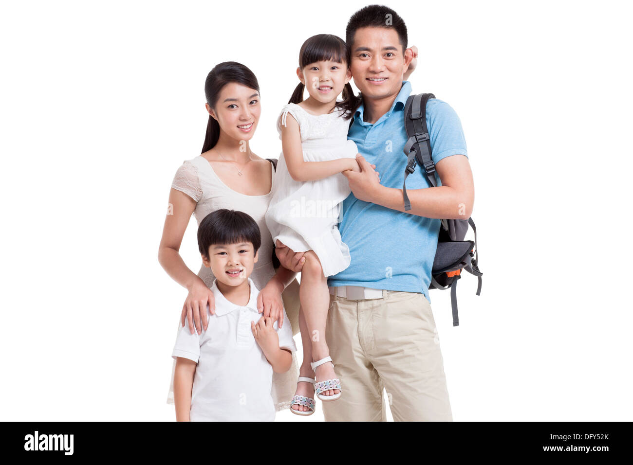 Happy young parents and two children Stock Photo - Alamy