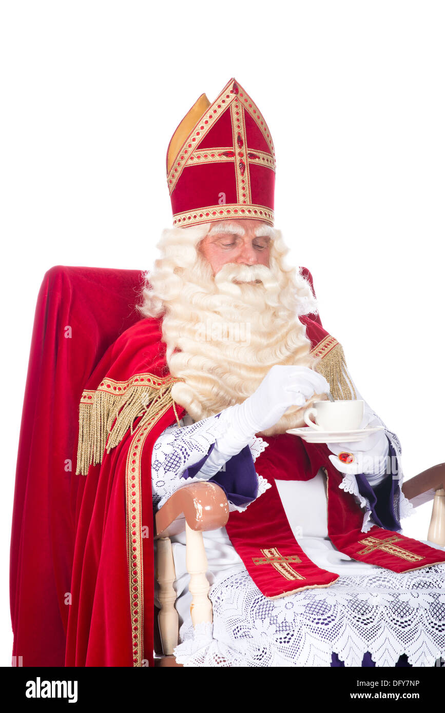Sinterklaas is resting on his chair, drinking a cup of coffee Stock ...