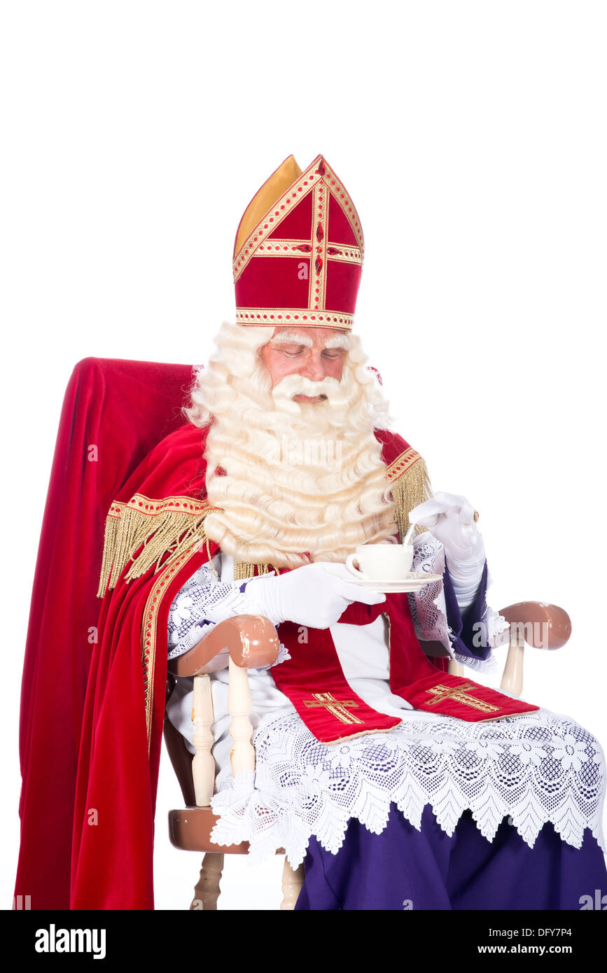 Sinterklaas is resting on his chair, drinking a cup of coffee Stock ...