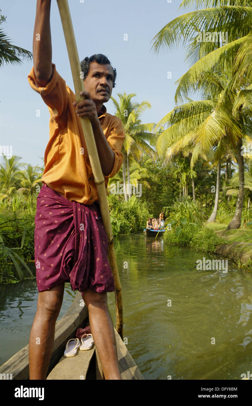 Indian man punting in kerala hi-res stock photography and images - Alamy