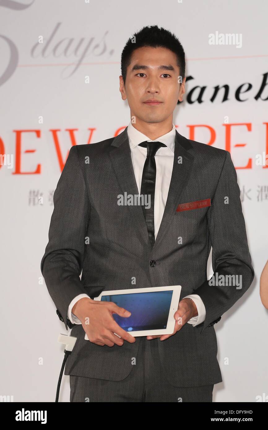 Taipei, China. 8th Oct, 2013. Actor Mark Chao presents commercial ...