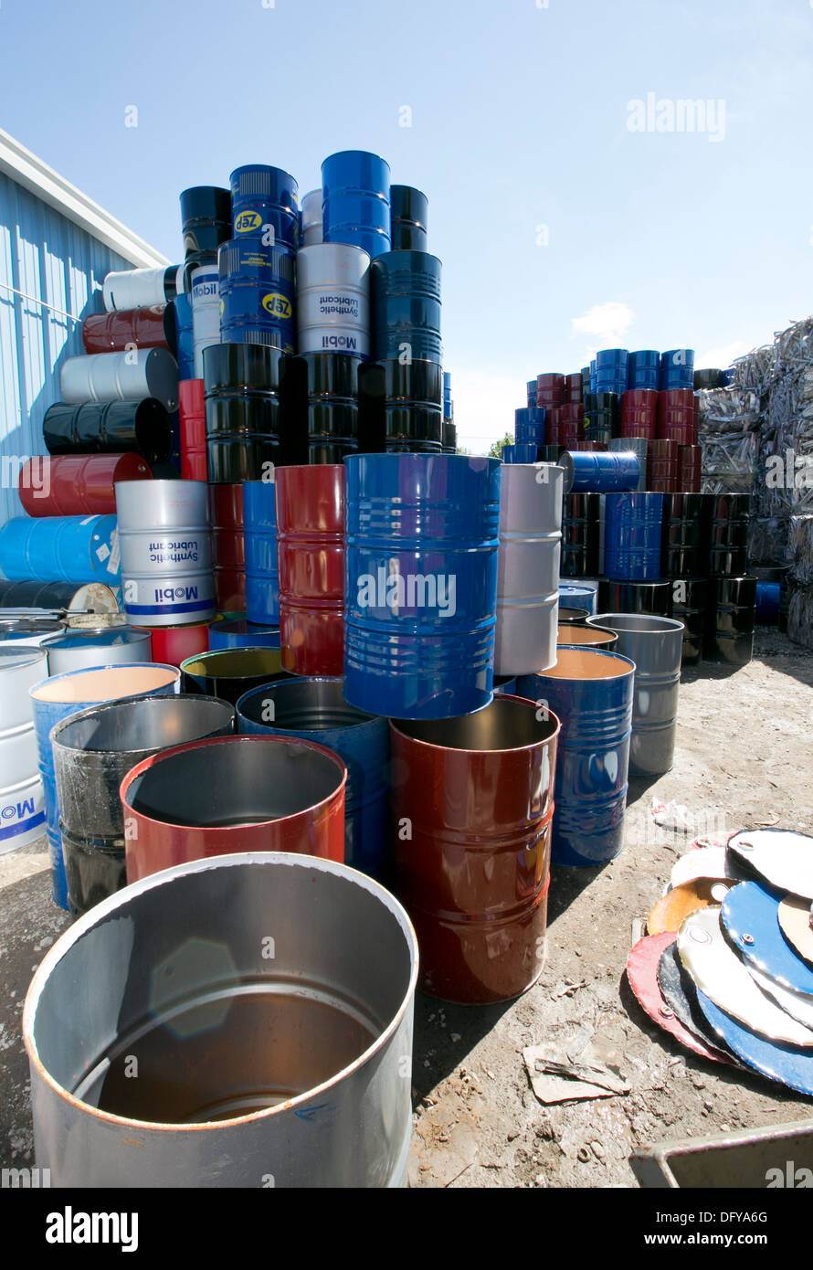Metal oil barrels brought into scrap metal recycling yard in Texas ...