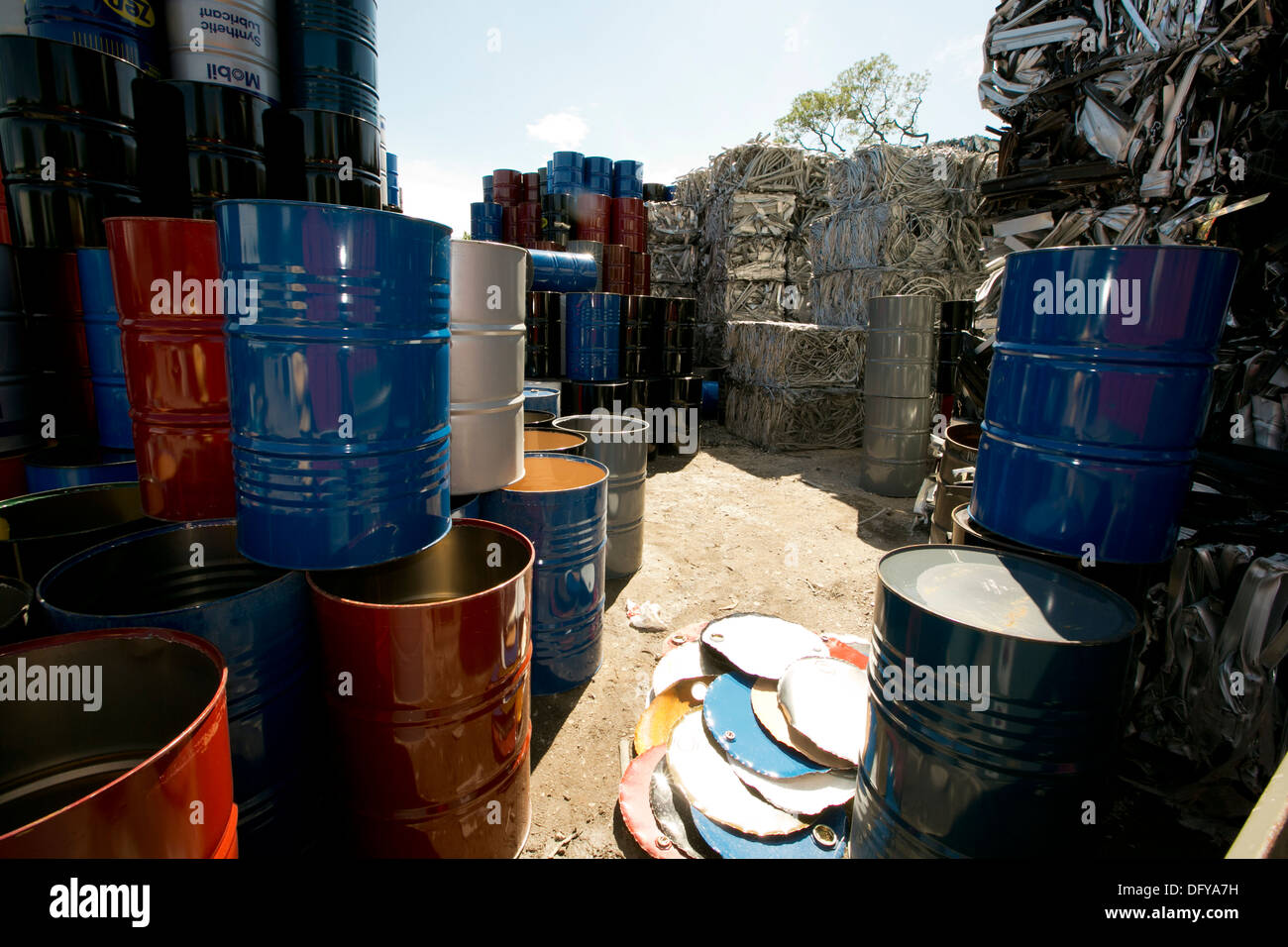 Metal oil barrels brought into scrap metal recycling yard in Texas ...