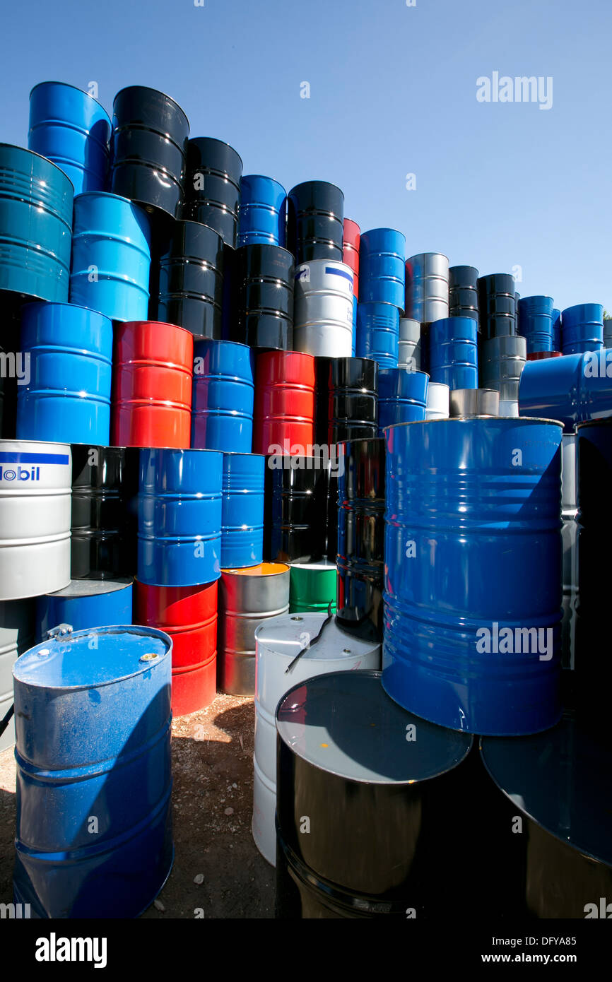 Metal oil barrels brought into scrap metal recycling yard in Texas ...