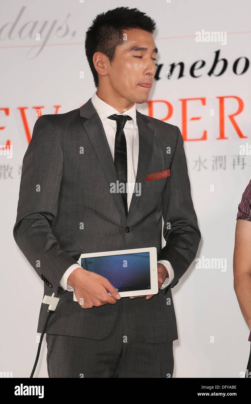 Taipei, China. 8th Oct, 2013. Actor Mark Chao presents commercial ...