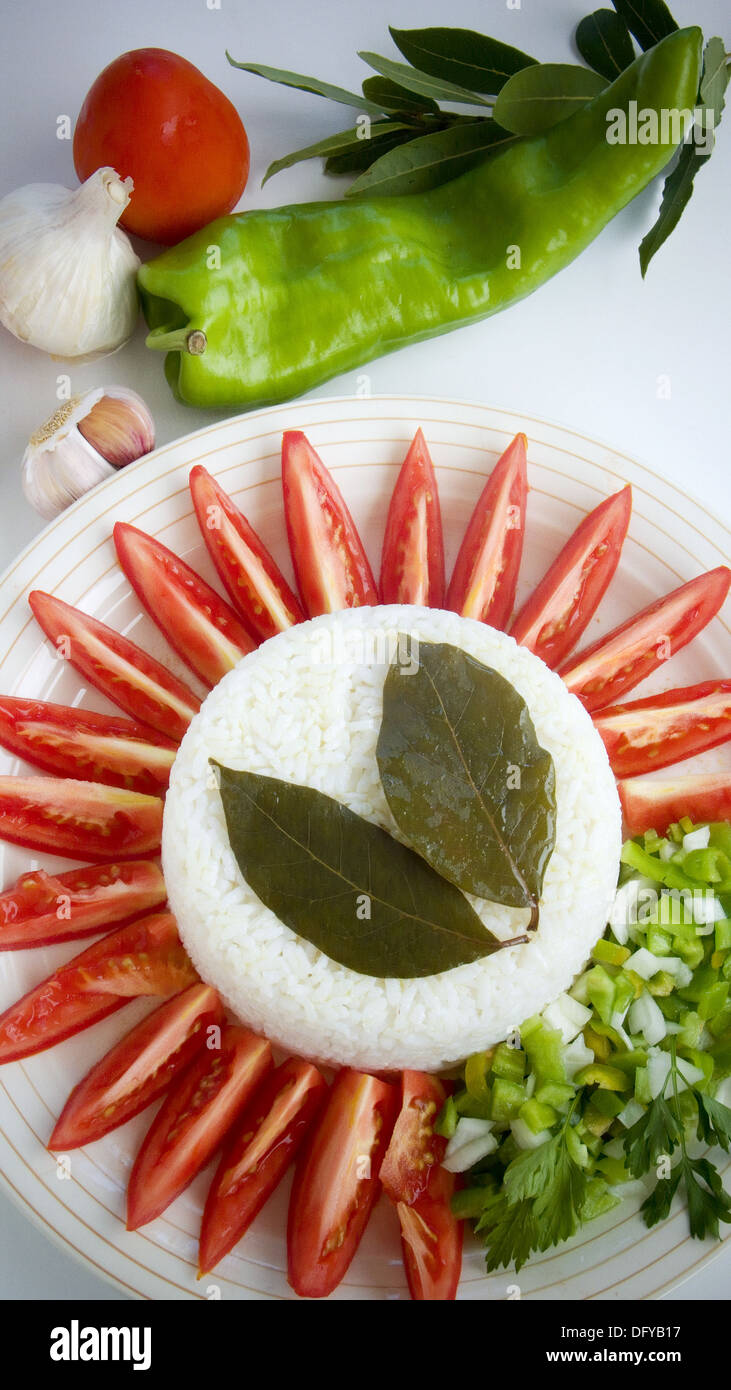 White rice with bay leaves and garlic, vegetables Stock Photo - Alamy