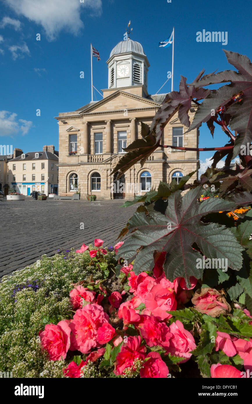 Kelso Town Hall and square with flowering planters in summer, Scotland ...